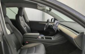 Grey Tesla Model Y 2021 in Riga, with an engine capacity of 0.00 L and mileage of 36 thousand km for 39500 €, photo 4 on AUTOMOTO.COM.LV