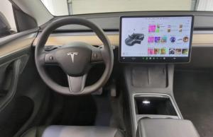 Grey Tesla Model Y 2021 in Riga, with an engine capacity of 0.00 L and mileage of 36 thousand km for 39500 €, photo 7 on AUTOMOTO.COM.LV