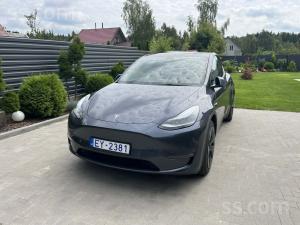 Pelēks Tesla Model Y 2022 Rīga, ar dzinēja tilpumu 0.00 L un nobraukumu 95 tūkst. km par 29500 €, foto 2 vietnē AUTOMOTO.COM.LV