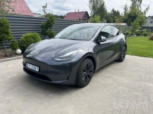 Pelēks Tesla Model Y 2022 Rīga, ar dzinēja tilpumu 0.00 L un nobraukumu 95 tūkst. km par 29500 €, foto 4 vietnē AUTOMOTO.COM.LV