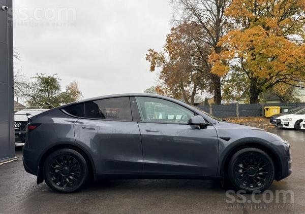 Pelēks Tesla Model Y 2022 Rīga, ar dzinēja tilpumu 0.00 L un nobraukumu 141 tūkst. km par 28500 €, foto 6 vietnē AUTOMOTO.COM.LV