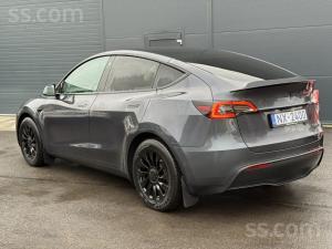 Grey Tesla Model Y 2022 in Riga, with an engine capacity of 0.00 L and mileage of 141 thousand km for 28500 €, photo 8 on AUTOMOTO.COM.LV