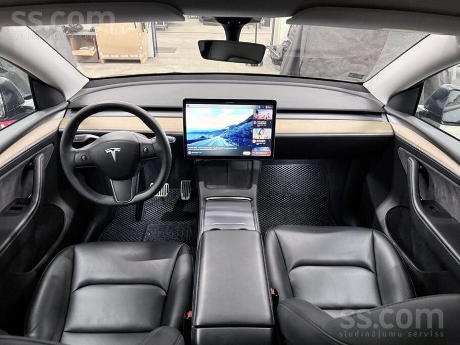 Grey Tesla Model Y 2022 in Riga, with an engine capacity of 0.00 L and mileage of 141 thousand km for 28500 €, photo 10 on AUTOMOTO.COM.LV