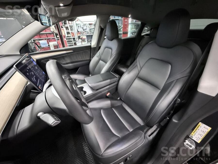 Grey Tesla Model Y 2022 in Riga, with an engine capacity of 0.00 L and mileage of 141 thousand km for 28500 €, photo 11 on AUTOMOTO.COM.LV
