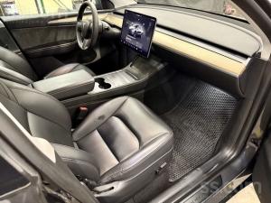 Grey Tesla Model Y 2022 in Riga, with an engine capacity of 0.00 L and mileage of 141 thousand km for 28500 €, photo 13 on AUTOMOTO.COM.LV