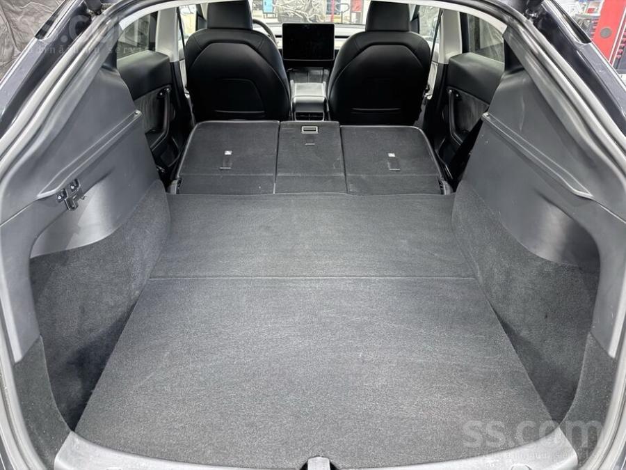 Grey Tesla Model Y 2022 in Riga, with an engine capacity of 0.00 L and mileage of 141 thousand km for 28500 €, photo 16 on AUTOMOTO.COM.LV