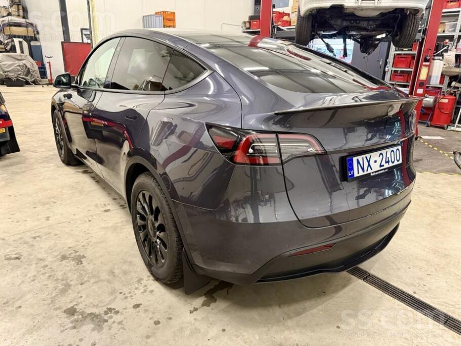 Grey Tesla Model Y 2022 in Riga, with an engine capacity of 0.00 L and mileage of 141 thousand km for 28500 €, photo 26 on AUTOMOTO.COM.LV