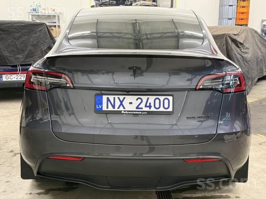 Grey Tesla Model Y 2022 in Riga, with an engine capacity of 0.00 L and mileage of 141 thousand km for 28500 €, photo 28 on AUTOMOTO.COM.LV