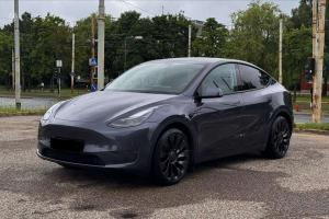 Grey Tesla Model Y 2022 in Vilnius, with an engine capacity of 0.00 L and mileage of 60 thousand km for 27600 €, photo  on AUTOMOTO.COM.LV