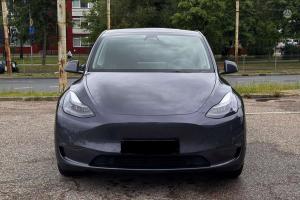 Grey Tesla Model Y 2022 in Vilnius, with an engine capacity of 0.00 L and mileage of 60 thousand km for 27600 €, photo 4 on AUTOMOTO.COM.LV