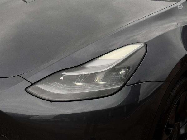 Grey Tesla Model Y 2022 in Vilnius, with an engine capacity of 0.00 L and mileage of 60 thousand km for 27600 €, photo 7 on AUTOMOTO.COM.LV