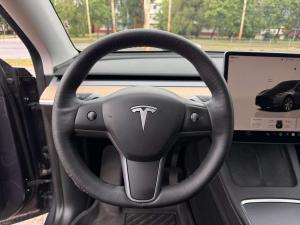 Grey Tesla Model Y 2022 in Vilnius, with an engine capacity of 0.00 L and mileage of 60 thousand km for 27600 €, photo 12 on AUTOMOTO.COM.LV