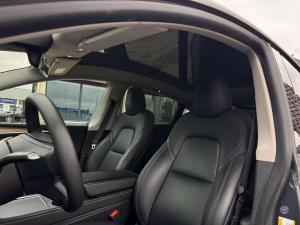 Grey Tesla Model Y 2022 in Vilnius, with an engine capacity of 0.00 L and mileage of 60 thousand km for 27600 €, photo 14 on AUTOMOTO.COM.LV