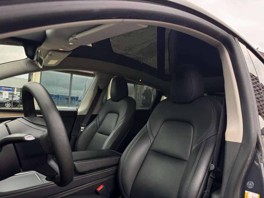 Grey Tesla Model Y 2022 in Vilnius, with an engine capacity of 0.00 L and mileage of 60 thousand km for 27600 €, photo 14 on AUTOMOTO.COM.LV