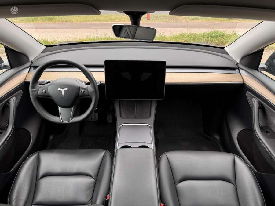 Grey Tesla Model Y 2022 in Vilnius, with an engine capacity of 0.00 L and mileage of 60 thousand km for 27600 €, photo 15 on AUTOMOTO.COM.LV