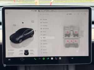 Grey Tesla Model Y 2022 in Vilnius, with an engine capacity of 0.00 L and mileage of 60 thousand km for 27600 €, photo 22 on AUTOMOTO.COM.LV