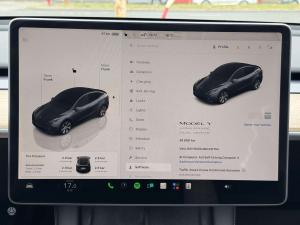 Grey Tesla Model Y 2022 in Vilnius, with an engine capacity of 0.00 L and mileage of 60 thousand km for 27600 €, photo 23 on AUTOMOTO.COM.LV