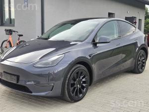 Pelēks Tesla Model Y 2022 Jūrmala, ar dzinēja tilpumu 0.00 L un nobraukumu 95 tūkst. km par 31000 €, foto  vietnē AUTOMOTO.COM.LV
