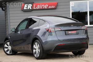 Grey Tesla Model Y 2022 in Tukums, with an engine capacity of 0.00 L and mileage of 77 thousand km for 33000 €, photo 5 on AUTOMOTO.COM.LV