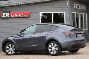 Grey Tesla Model Y 2022 in Tukums, with an engine capacity of 0.00 L and mileage of 77 thousand km for 33000 €, photo 7 on AUTOMOTO.COM.LV