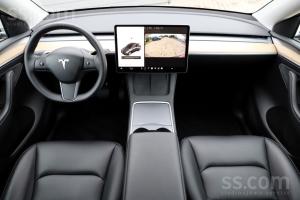Grey Tesla Model Y 2022 in Tukums, with an engine capacity of 0.00 L and mileage of 77 thousand km for 33000 €, photo 8 on AUTOMOTO.COM.LV