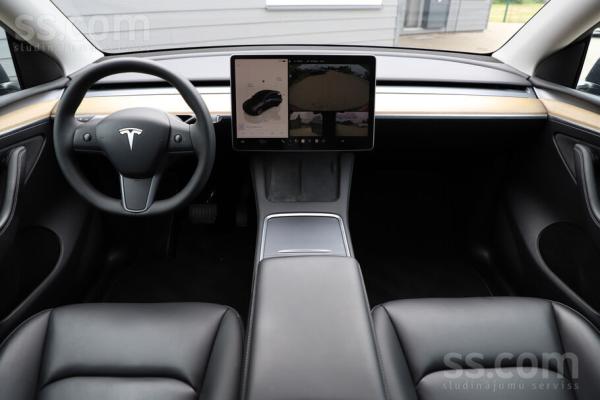 Grey Tesla Model Y 2022 in Tukums, with an engine capacity of 0.00 L and mileage of 114 thousand km for 30000 €, photo 7 on AUTOMOTO.COM.LV