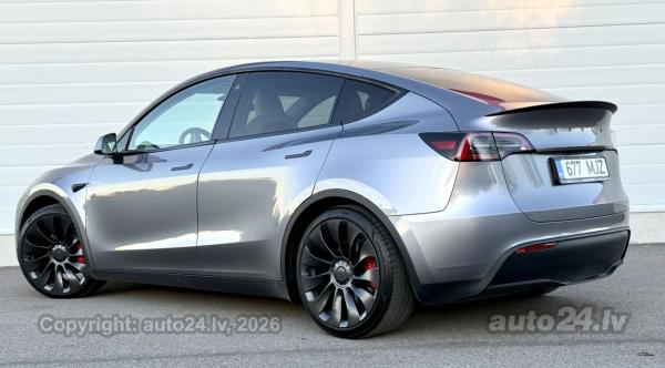 Grey Tesla Model Y 2023 in Tallinn, with an engine capacity of 0.00 L and mileage of 69 thousand km for 36500 €, photo 2 on AUTOMOTO.COM.LV