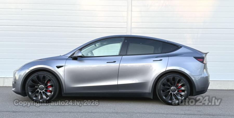 Grey Tesla Model Y 2023 in Tallinn, with an engine capacity of 0.00 L and mileage of 69 thousand km for 36500 €, photo 6 on AUTOMOTO.COM.LV