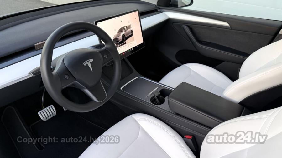 Grey Tesla Model Y 2023 in Tallinn, with an engine capacity of 0.00 L and mileage of 69 thousand km for 36500 €, photo 7 on AUTOMOTO.COM.LV