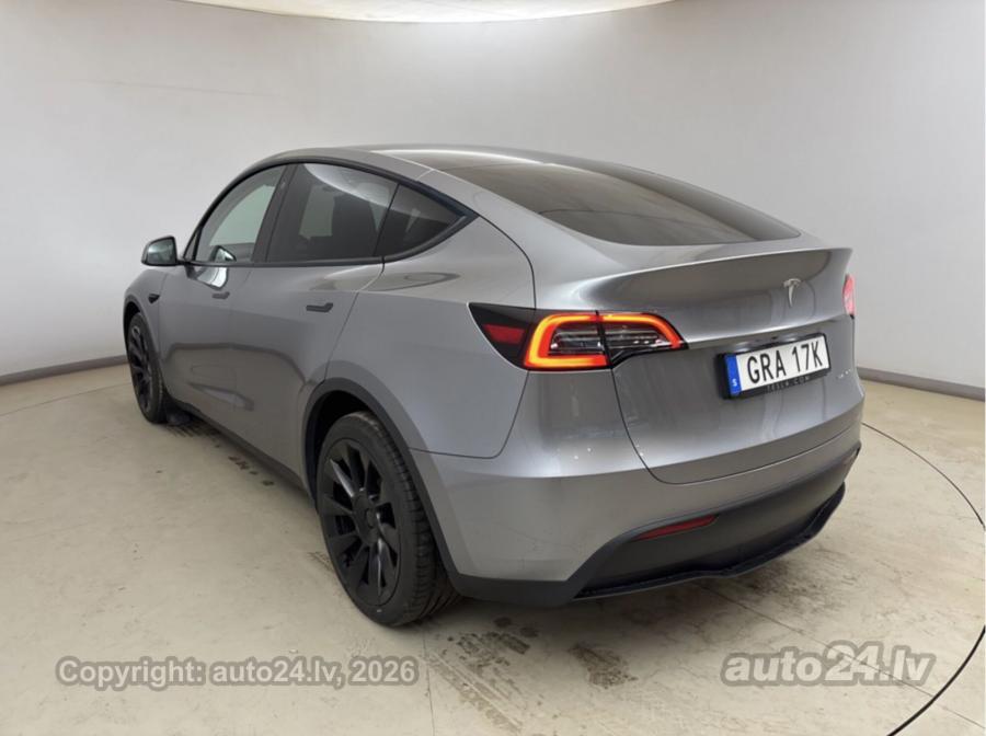 Grey Tesla Model Y 2023 in Tallinn, with an engine capacity of 0.00 L and mileage of 50 thousand km for 40990 €, photo 4 on AUTOMOTO.COM.LV