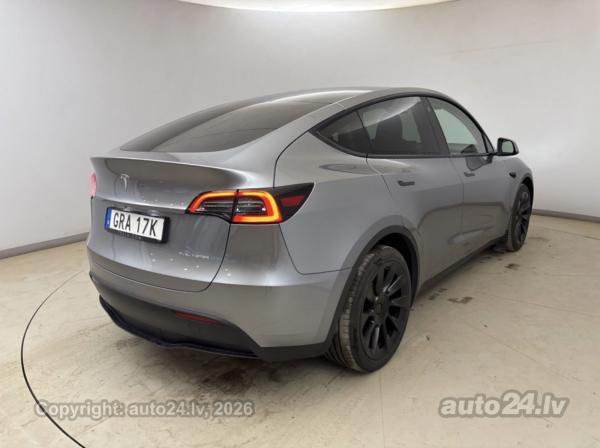 Grey Tesla Model Y 2023 in Tallinn, with an engine capacity of 0.00 L and mileage of 50 thousand km for 40990 €, photo 4 on AUTOMOTO.COM.LV