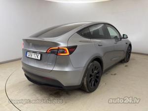 Grey Tesla Model Y 2023 in Tallinn, with an engine capacity of 0.00 L and mileage of 50 thousand km for 40990 €, photo 5 on AUTOMOTO.COM.LV
