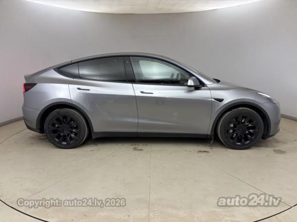 Grey Tesla Model Y 2023 in Tallinn, with an engine capacity of 0.00 L and mileage of 50 thousand km for 40990 €, photo 5 on AUTOMOTO.COM.LV