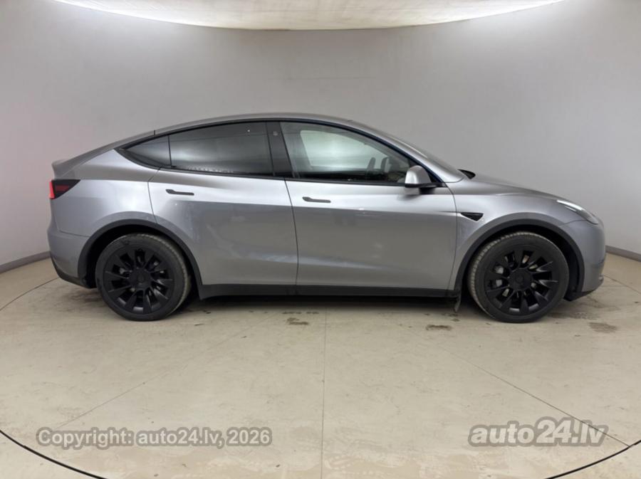 Grey Tesla Model Y 2023 in Tallinn, with an engine capacity of 0.00 L and mileage of 50 thousand km for 40990 €, photo 6 on AUTOMOTO.COM.LV