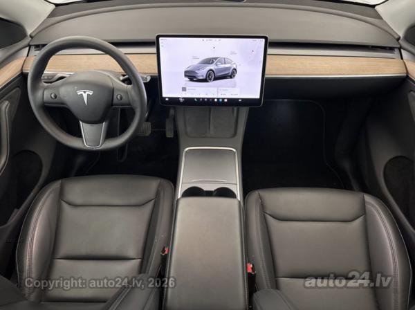 Grey Tesla Model Y 2023 in Tallinn, with an engine capacity of 0.00 L and mileage of 50 thousand km for 40990 €, photo 6 on AUTOMOTO.COM.LV