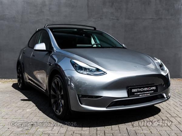 Grey Tesla Model Y 2023 in Tallinn, with an engine capacity of 0.00 L and mileage of 26 thousand km for 41990 €, photo 2 on AUTOMOTO.COM.LV