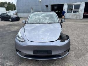 Grey Tesla Model Y 2023 in Radviliskis, with an engine capacity of 0.00 L and mileage of 27 thousand km for 19650 €, photo 3 on AUTOMOTO.COM.LV