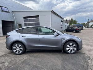 Grey Tesla Model Y 2023 in Radviliskis, with an engine capacity of 0.00 L and mileage of 27 thousand km for 19650 €, photo 5 on AUTOMOTO.COM.LV