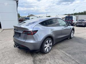 Grey Tesla Model Y 2023 in Radviliskis, with an engine capacity of 0.00 L and mileage of 27 thousand km for 19650 €, photo 6 on AUTOMOTO.COM.LV