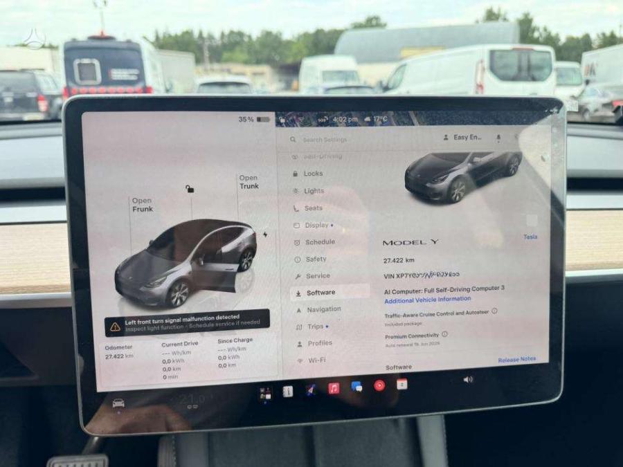 Grey Tesla Model Y 2023 in Radviliskis, with an engine capacity of 0.00 L and mileage of 27 thousand km for 19650 €, photo 11 on AUTOMOTO.COM.LV