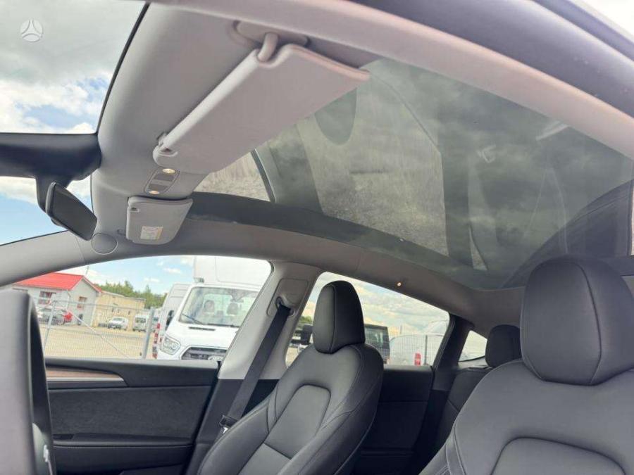 Grey Tesla Model Y 2023 in Radviliskis, with an engine capacity of 0.00 L and mileage of 27 thousand km for 19650 €, photo 13 on AUTOMOTO.COM.LV