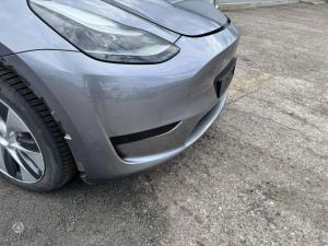 Grey Tesla Model Y 2023 in Radviliskis, with an engine capacity of 0.00 L and mileage of 27 thousand km for 19650 €, photo 34 on AUTOMOTO.COM.LV