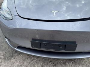 Grey Tesla Model Y 2023 in Radviliskis, with an engine capacity of 0.00 L and mileage of 27 thousand km for 19650 €, photo 35 on AUTOMOTO.COM.LV