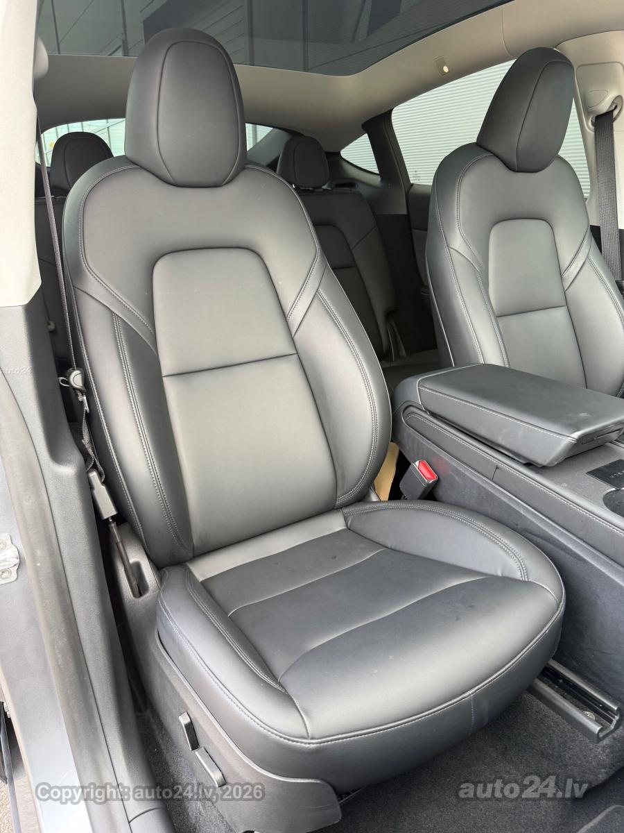 Grey Tesla Model Y 2023 in Tartu, with an engine capacity of 0.00 L and mileage of 22 thousand km for 40300 €, photo 13 on AUTOMOTO.COM.LV