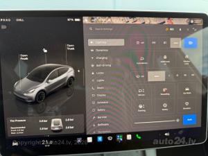 Grey Tesla Model Y 2023 in Tartu, with an engine capacity of 0.00 L and mileage of 22 thousand km for 40300 €, photo 29 on AUTOMOTO.COM.LV