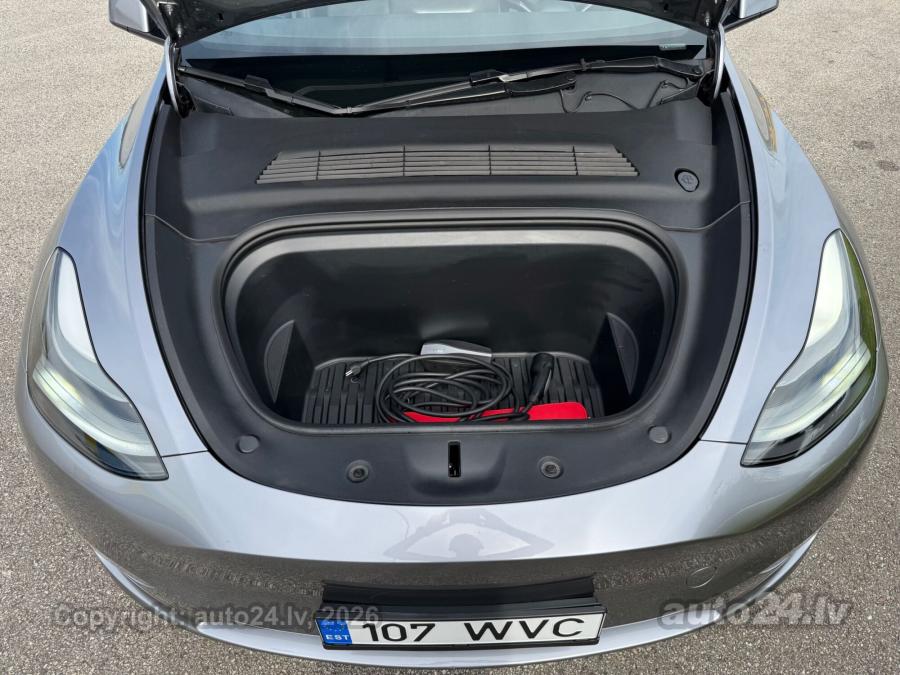 Grey Tesla Model Y 2023 in Tartu, with an engine capacity of 0.00 L and mileage of 22 thousand km for 40300 €, photo 30 on AUTOMOTO.COM.LV