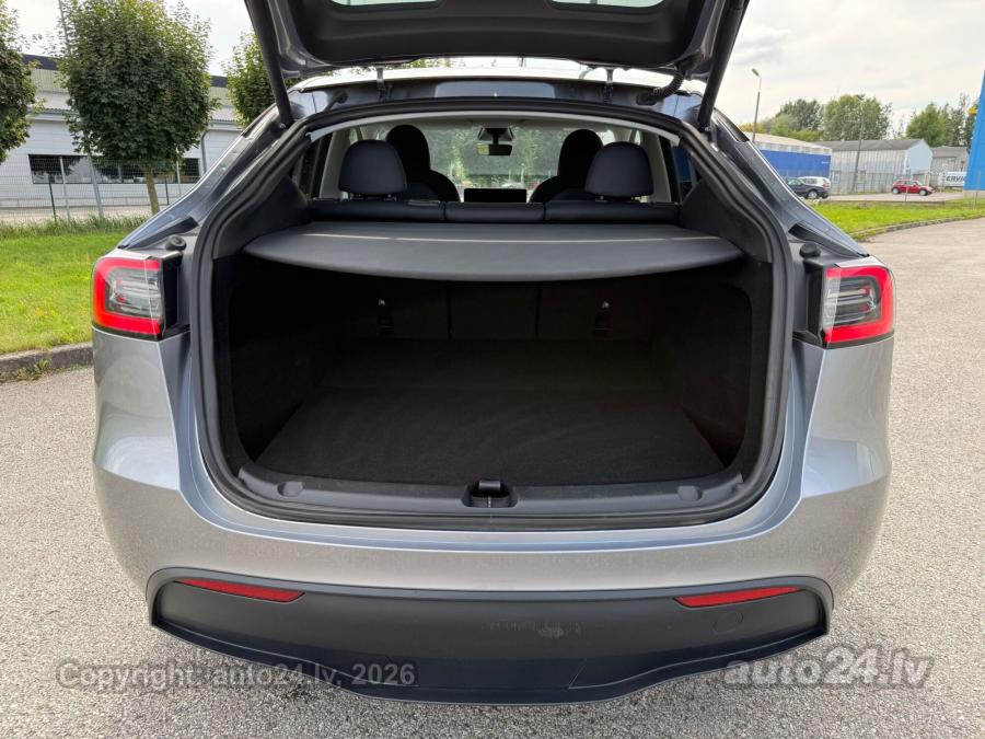 Grey Tesla Model Y 2023 in Tartu, with an engine capacity of 0.00 L and mileage of 22 thousand km for 40300 €, photo 31 on AUTOMOTO.COM.LV
