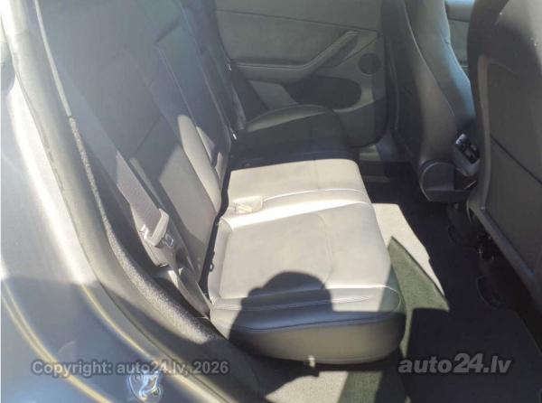 Grey Tesla Model Y 2023 in Tallinn, with an engine capacity of 0.00 L and mileage of 64 thousand km for 39990 €, photo 5 on AUTOMOTO.COM.LV