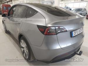 Grey Tesla Model Y 2023 in Tallinn, with an engine capacity of 0.00 L and mileage of 52 thousand km for 39990 €, photo 4 on AUTOMOTO.COM.LV