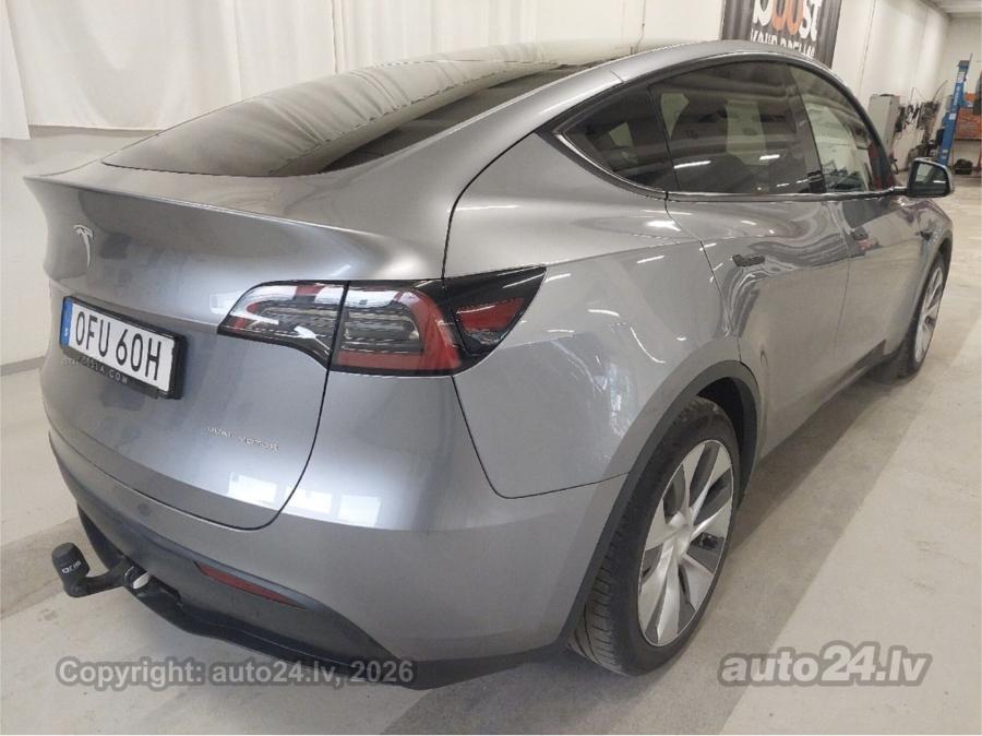 Grey Tesla Model Y 2023 in Tallinn, with an engine capacity of 0.00 L and mileage of 52 thousand km for 39990 €, photo 5 on AUTOMOTO.COM.LV